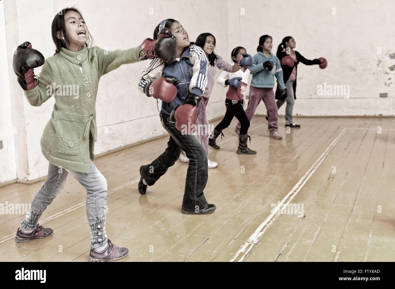 Peru, Cuzco Province, Cuzco, girls boxing at a self defense session in ...