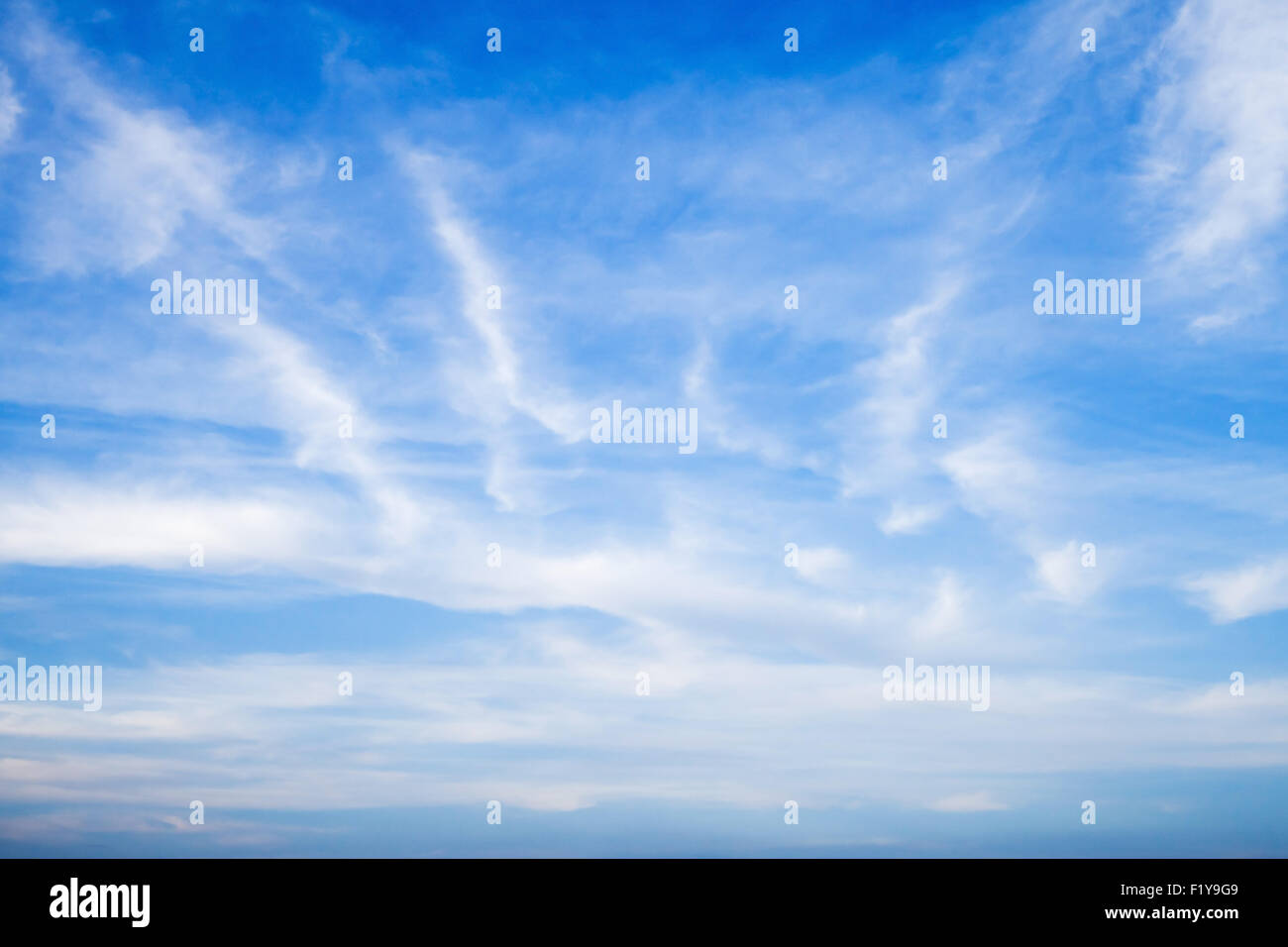 Altostratus and altocumulus. Blue sky with different types of clouds ...