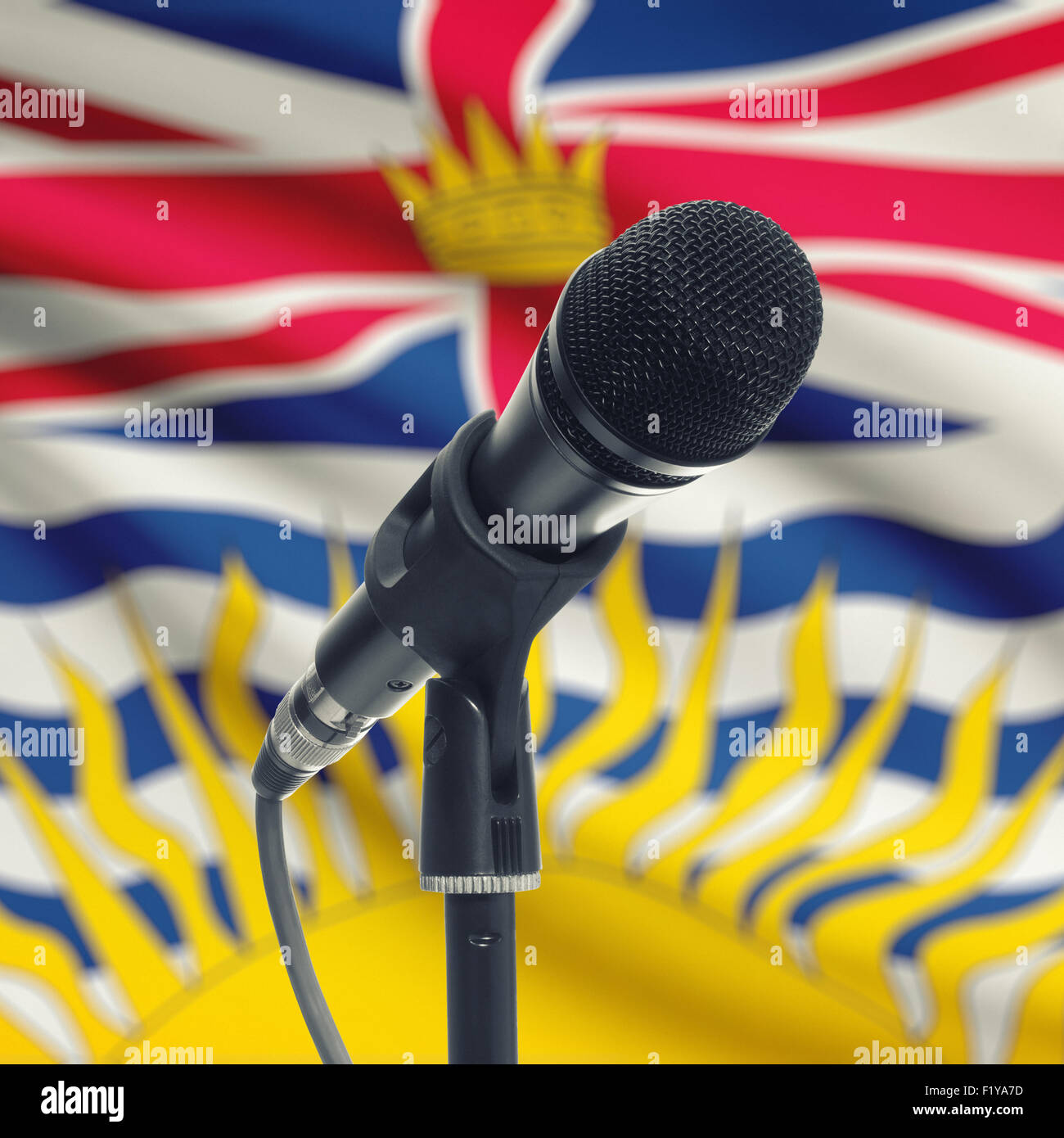 Microphone with Canadian province flag on background series - British ...