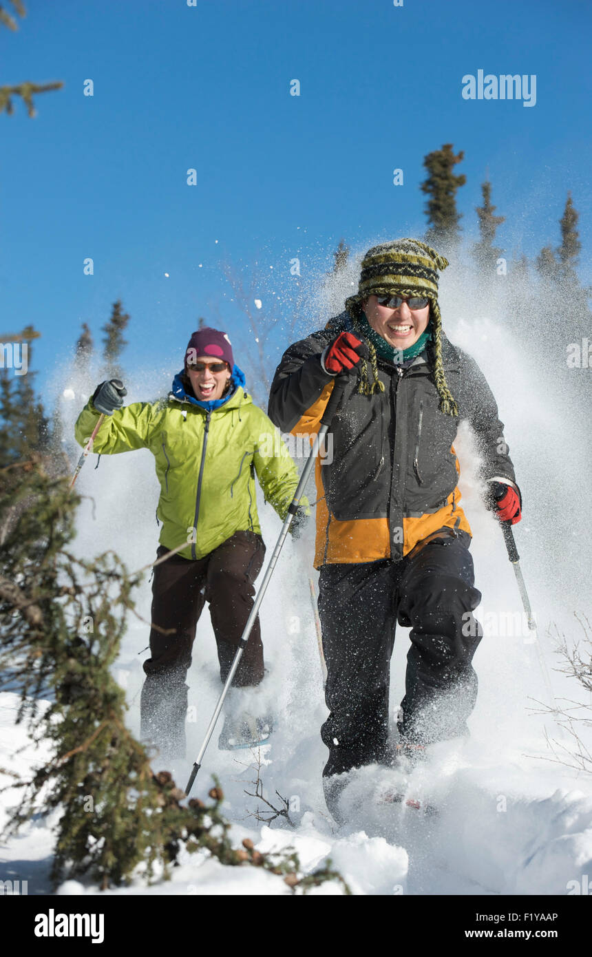 Man woman walking snowshoeing hi-res stock photography and images - Alamy