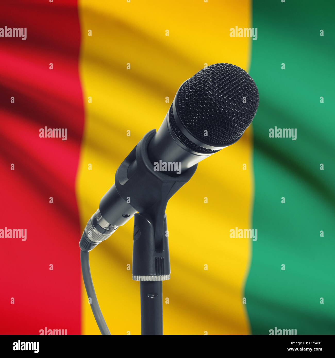 Microphone with national flag on background series - Guinea Stock Photo ...