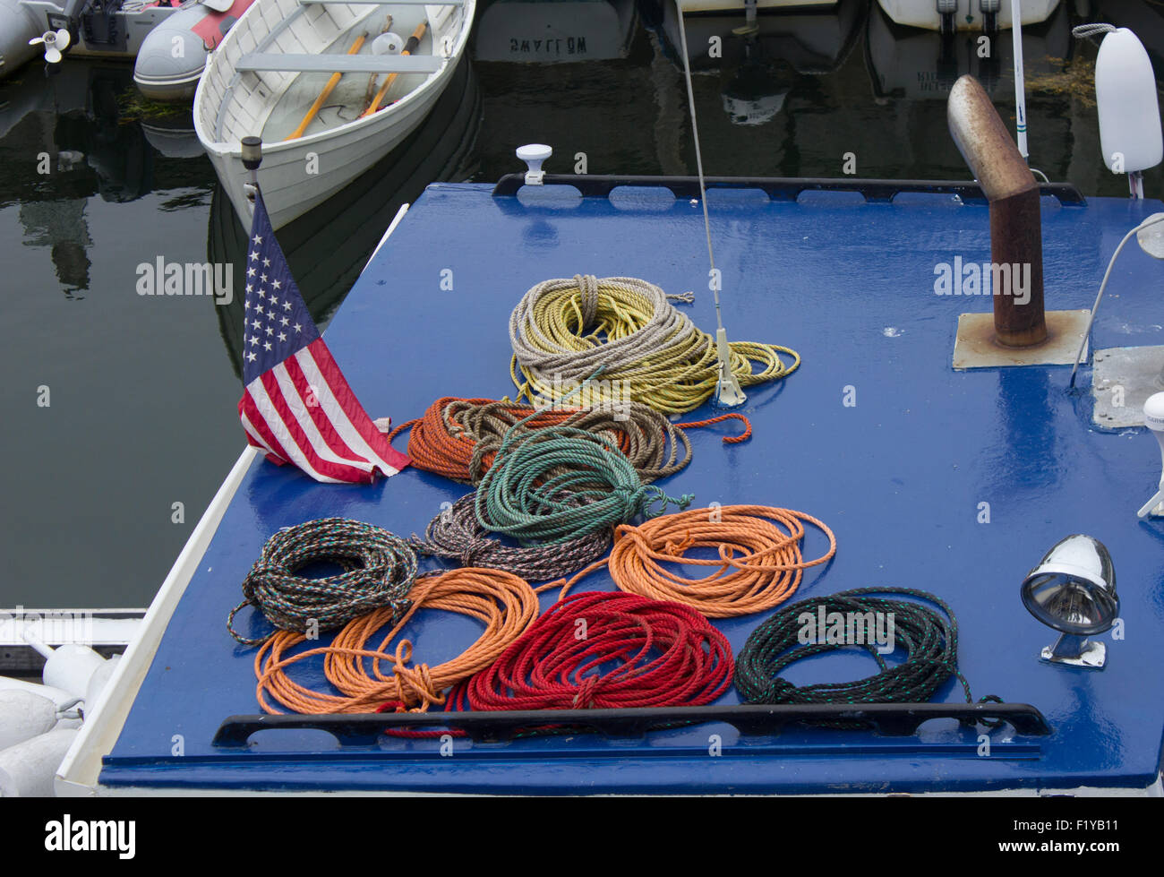 Colorful ropes coiled on the roof of a lobster boat Stock Photo - Alamy
