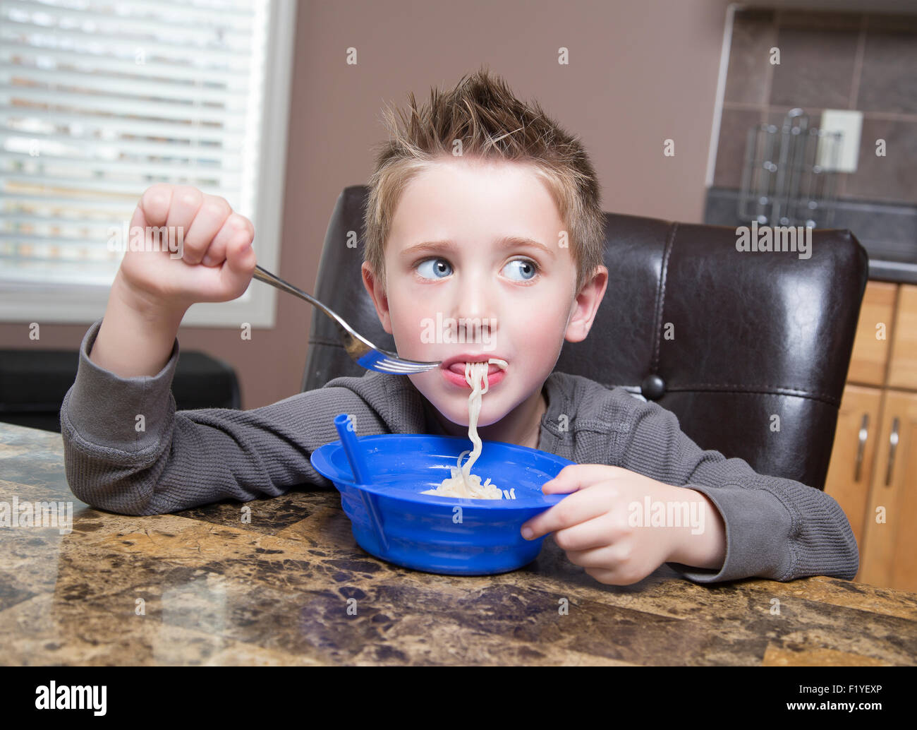 Boy eating food canada hi-res stock photography and images - Alamy