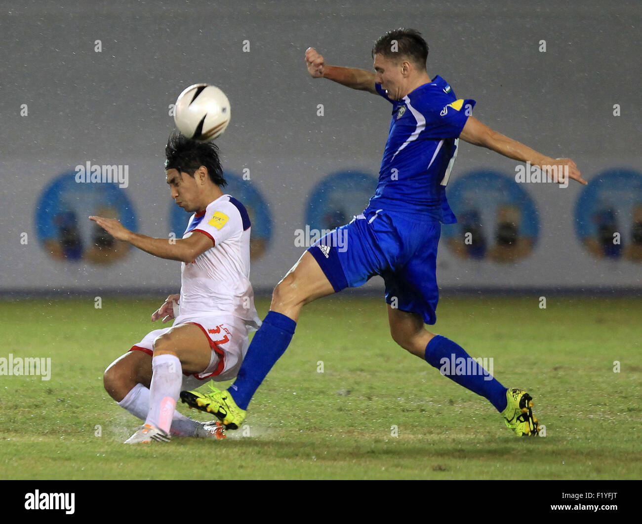 Bulacan, Philippines. 8th Sep, 2015. Igor Sergeev (R) of Uzbekistan ...