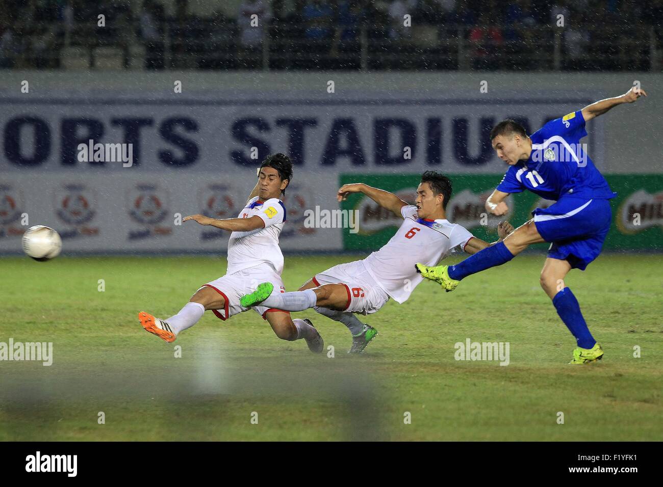 Bulacan, Philippines. 8th Sep, 2015. Igor Sergeev (R) of Uzbekistan ...