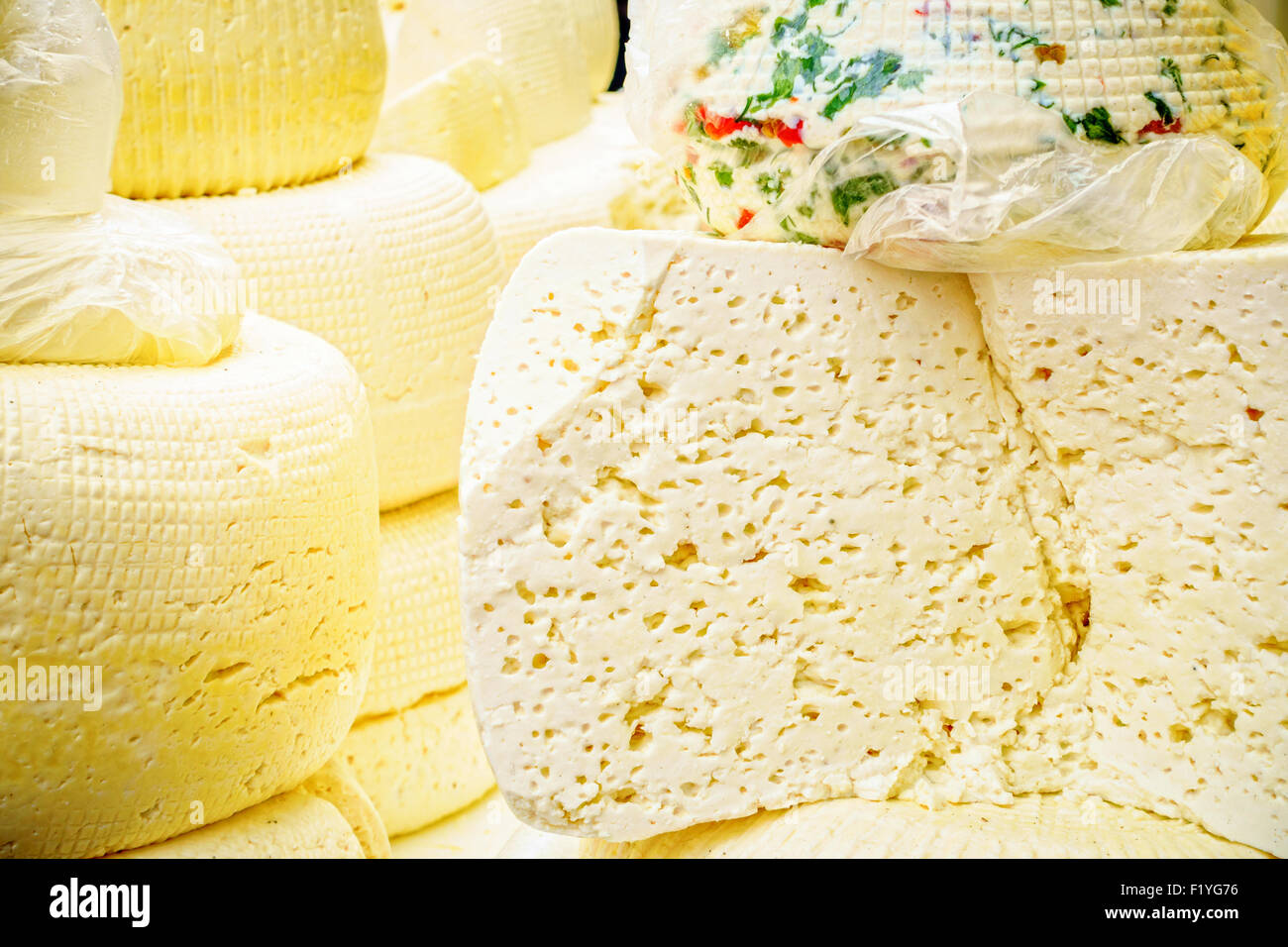 Cheese for sale at a farmers market in Pyatigorsk, Russia Stock Photo ...