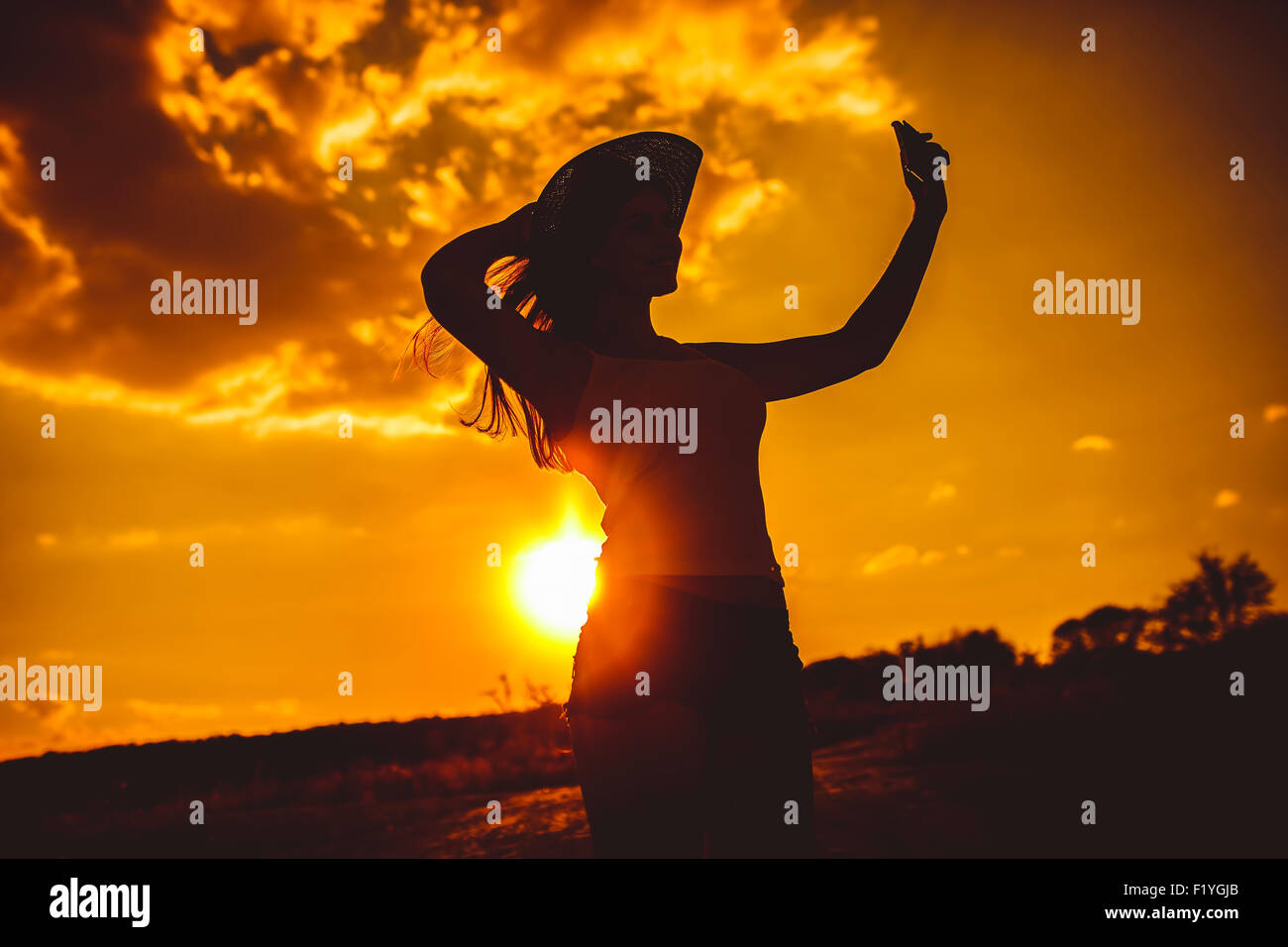 Self woman photo sELF at sunset Nature relieves himself on cellp Stock ...