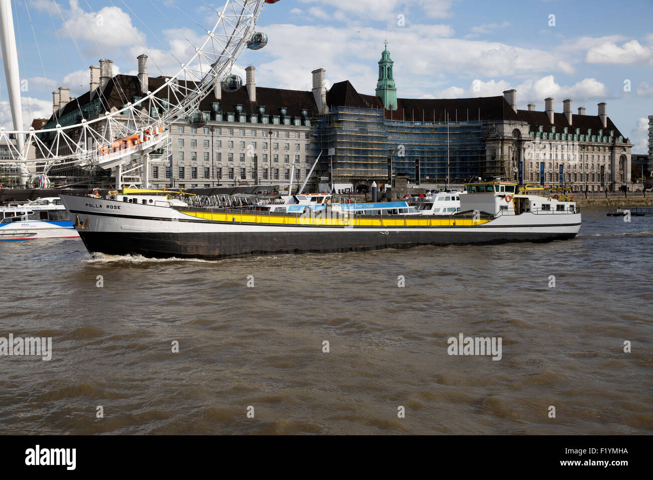 Polla Rose, general cargo boat, on the River Thames passing the London ...