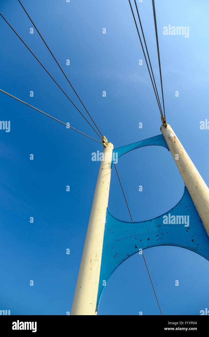 Old cable stayed bridge against blue sky Stock Photo - Alamy