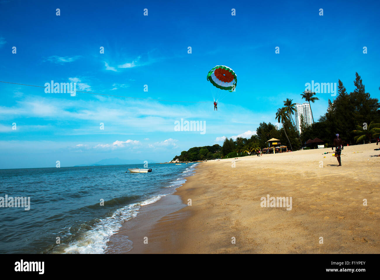 The beautiful Batu Feringgi beach in Penang Stock Photo - Alamy