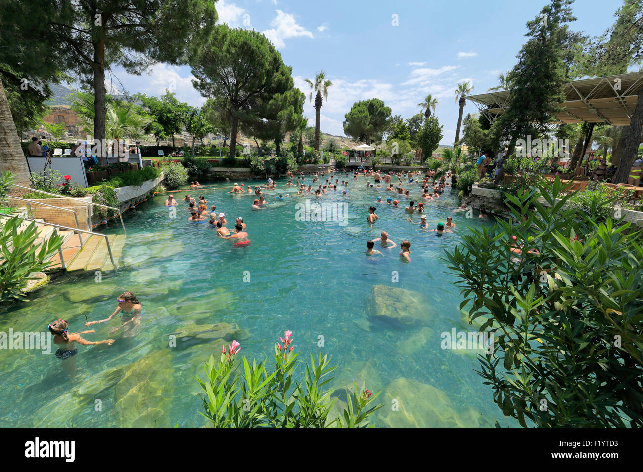 PAMUKKALE, TURKEY - JULY 9, 2015: A lot of peaople visit the Cleopatra ...