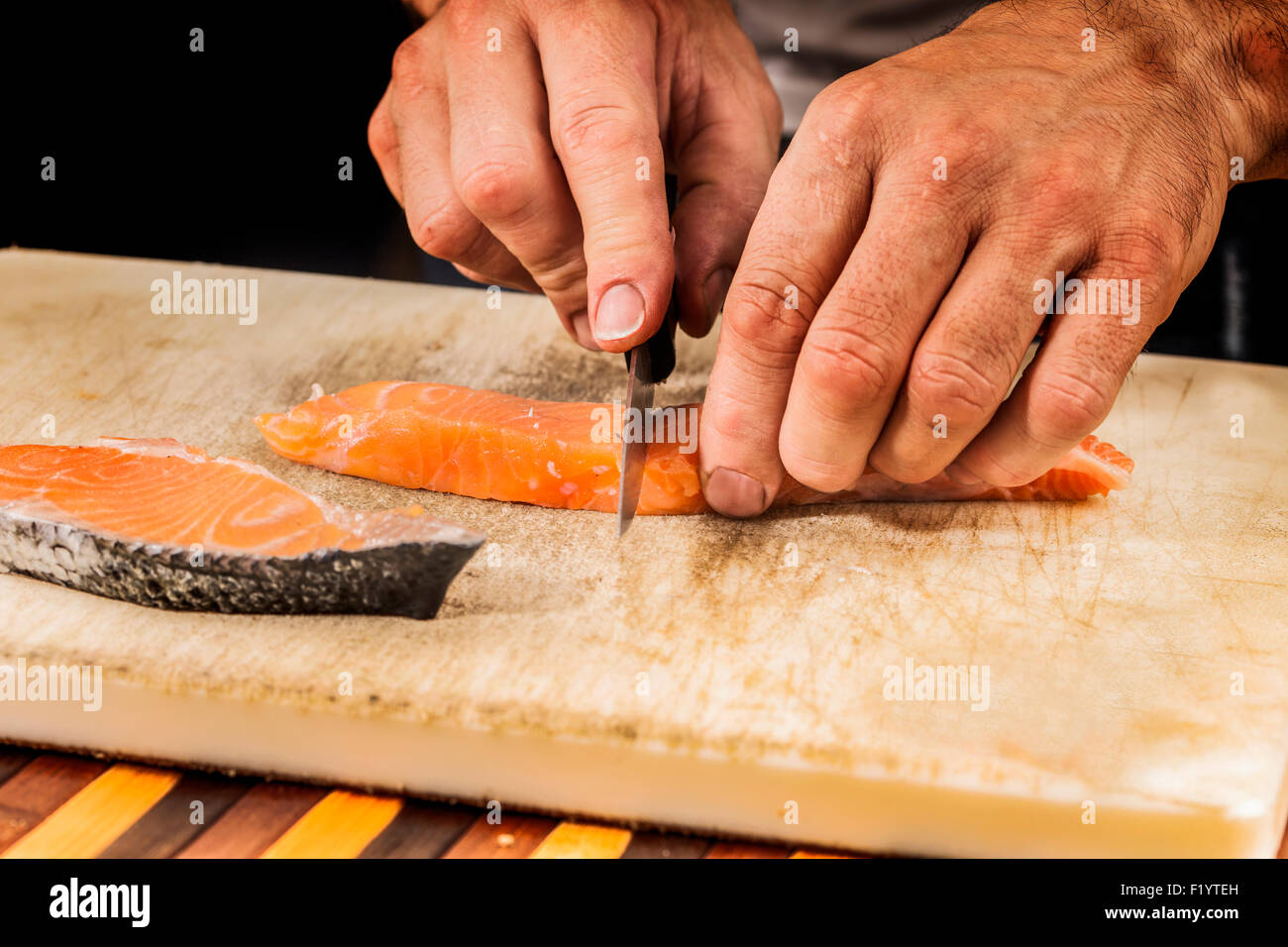 fishmonger at work Stock Photo - Alamy