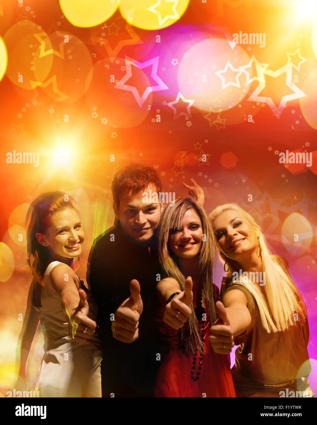 Happy friends in the night club Stock Photo - Alamy