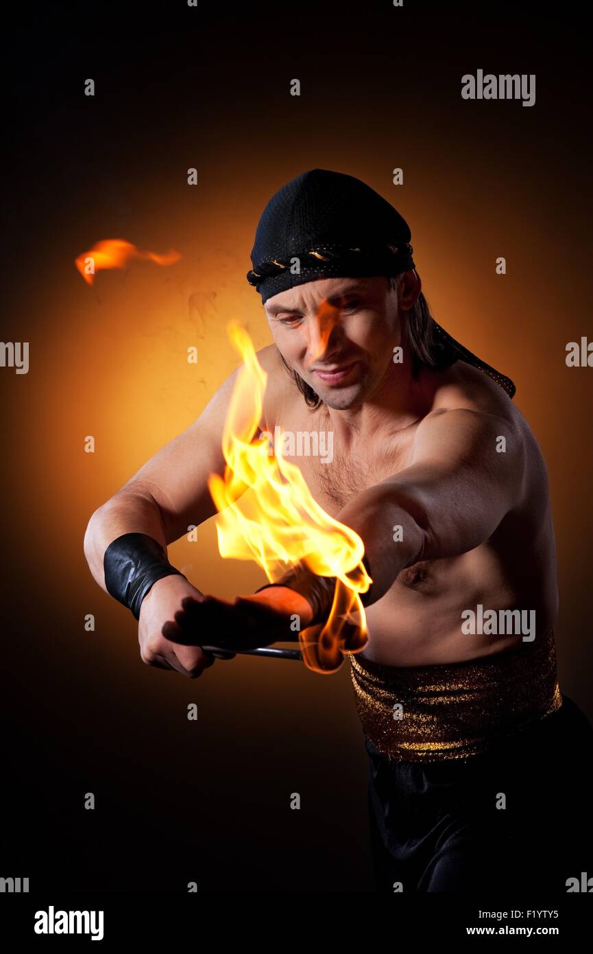 Fire show performance handsome male hi-res stock photography and images ...