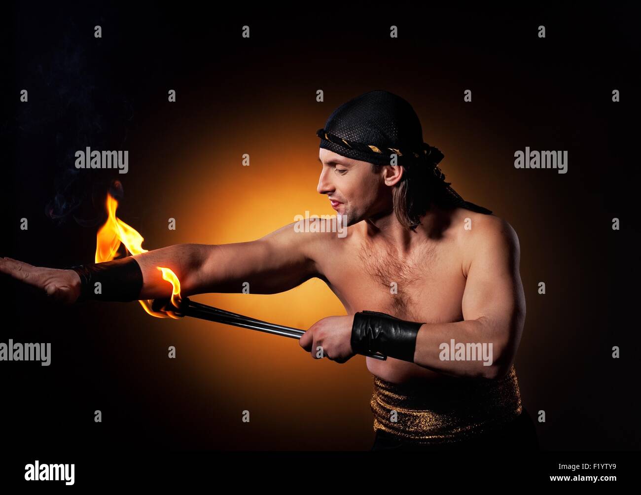 Fire show performance handsome male hi-res stock photography and images ...