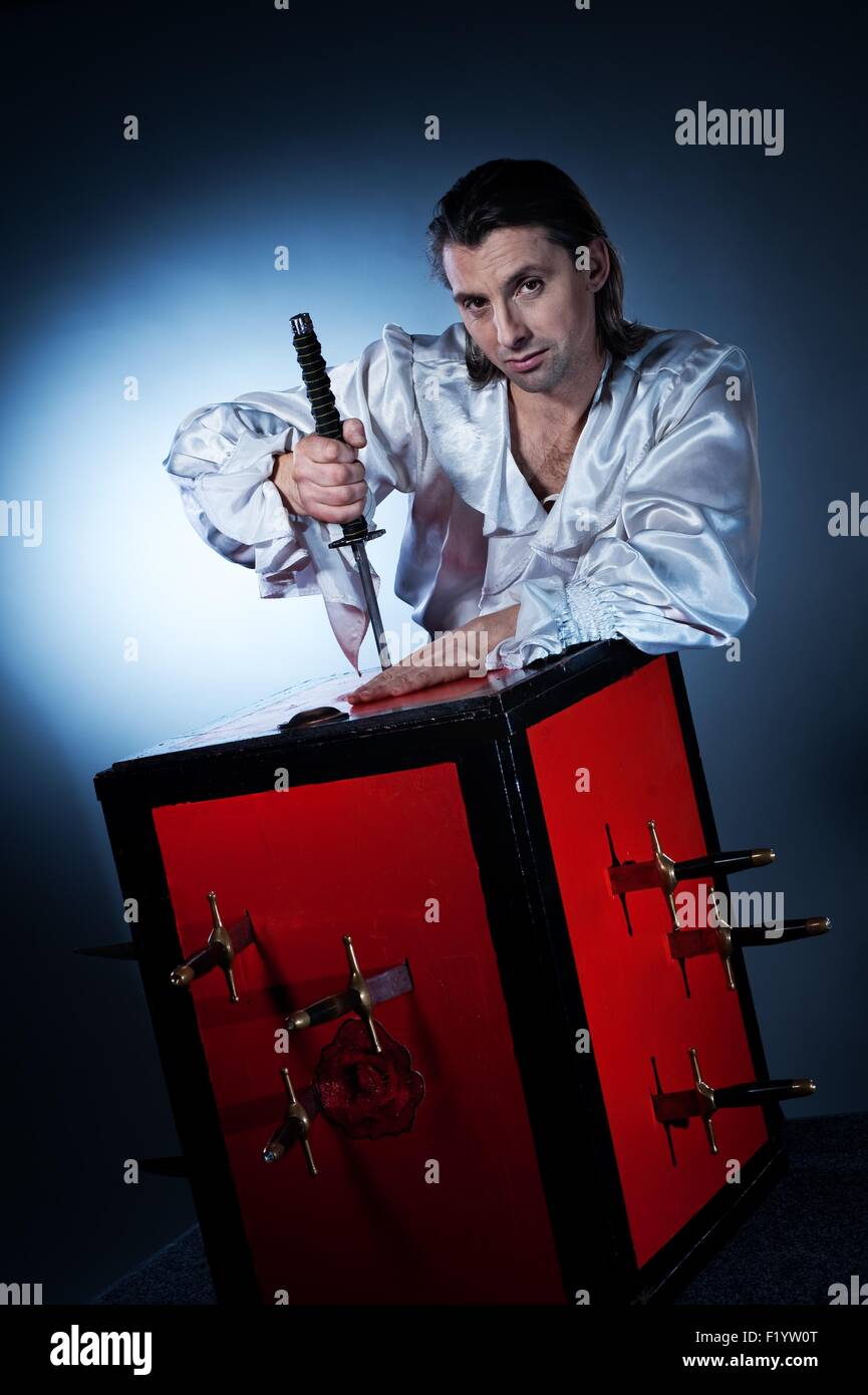 Sword box illusion Stock Photo - Alamy
