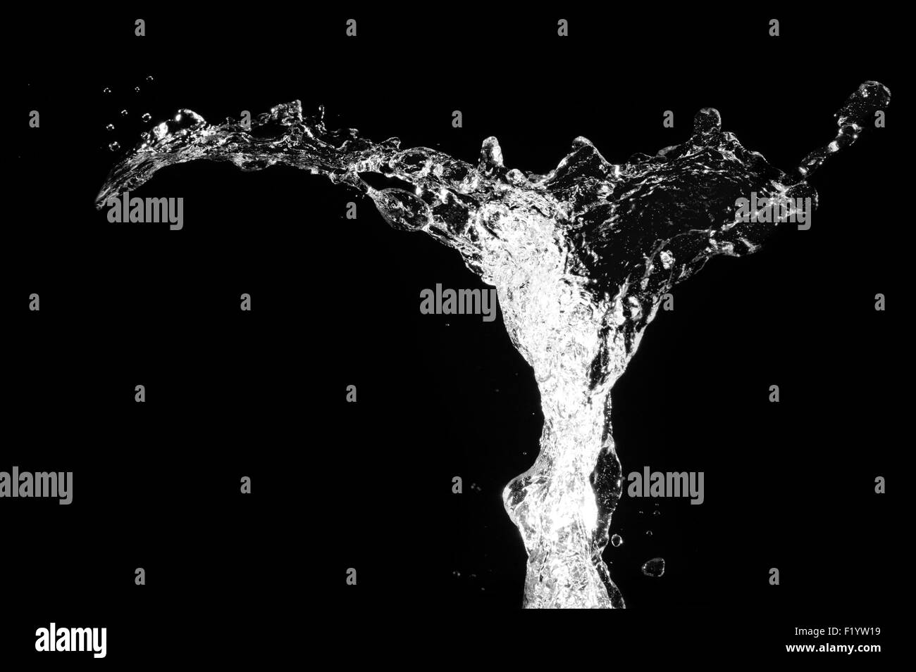 Stylish water splash. Isolated on black background Stock Photo - Alamy