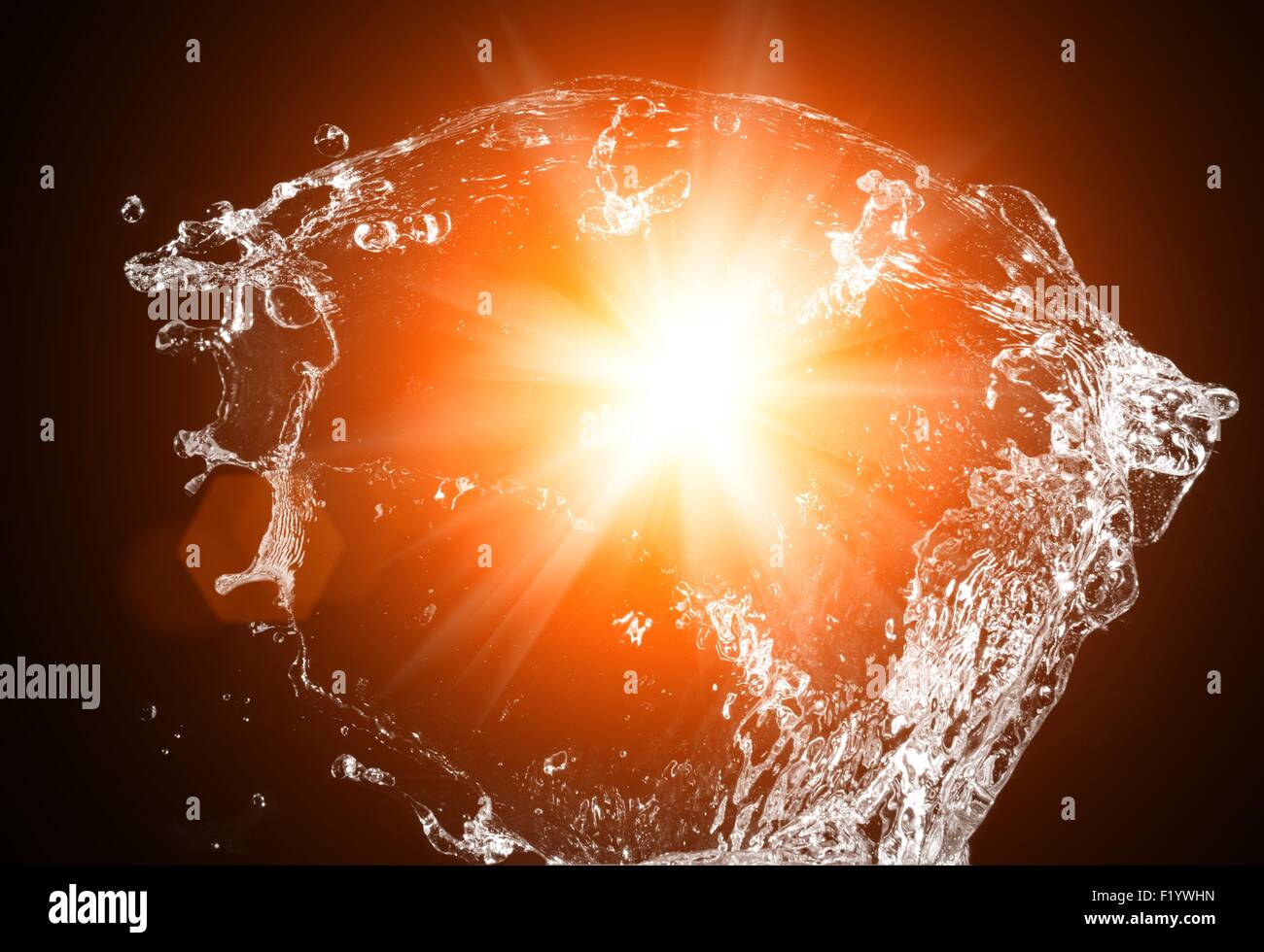 Stylish water splash over sunny background Stock Photo - Alamy