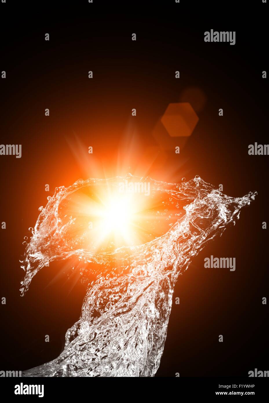 Stylish water splash over sunny background Stock Photo - Alamy