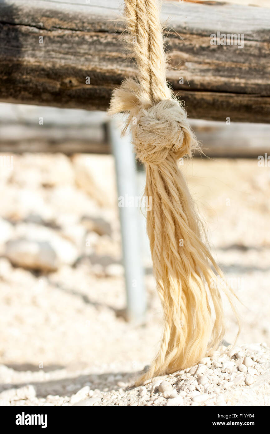 Old rope tied wooden pole hi-res stock photography and images - Alamy