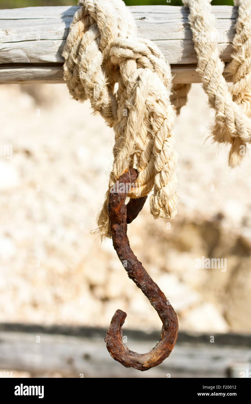 Old rope tied wooden pole hi-res stock photography and images - Alamy
