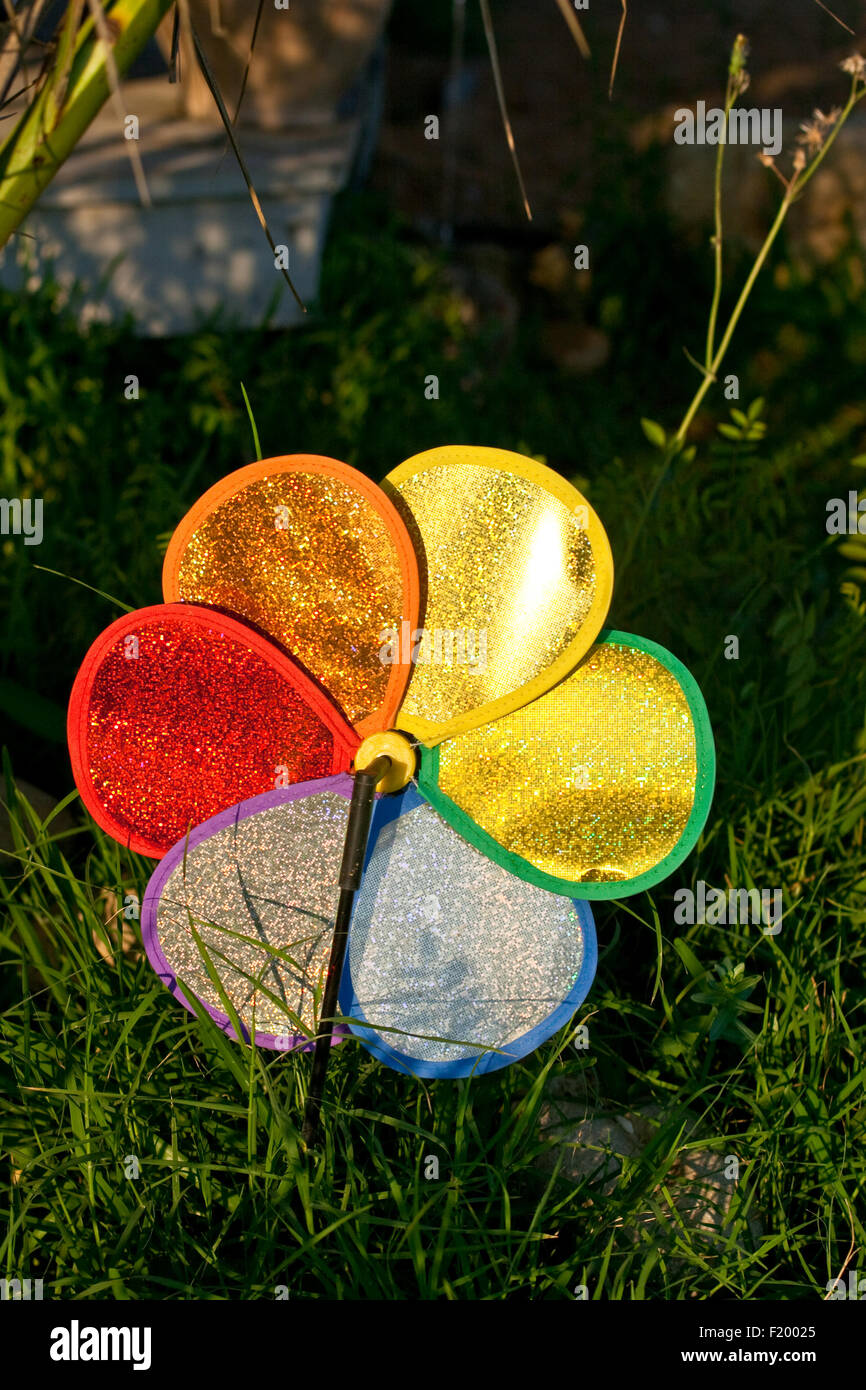 Colorful Pinwheel on the grass Stock Photo - Alamy