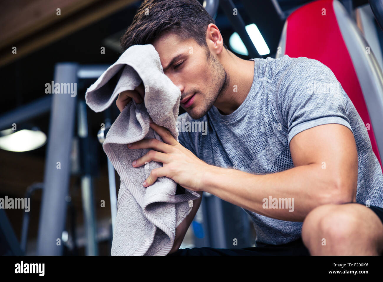 Handsome bodybuilder sitting on bench hi-res stock photography and ...