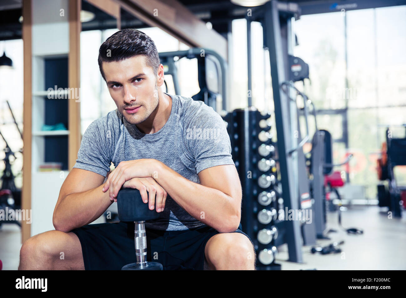 Sitting man gym bench hi-res stock photography and images - Alamy