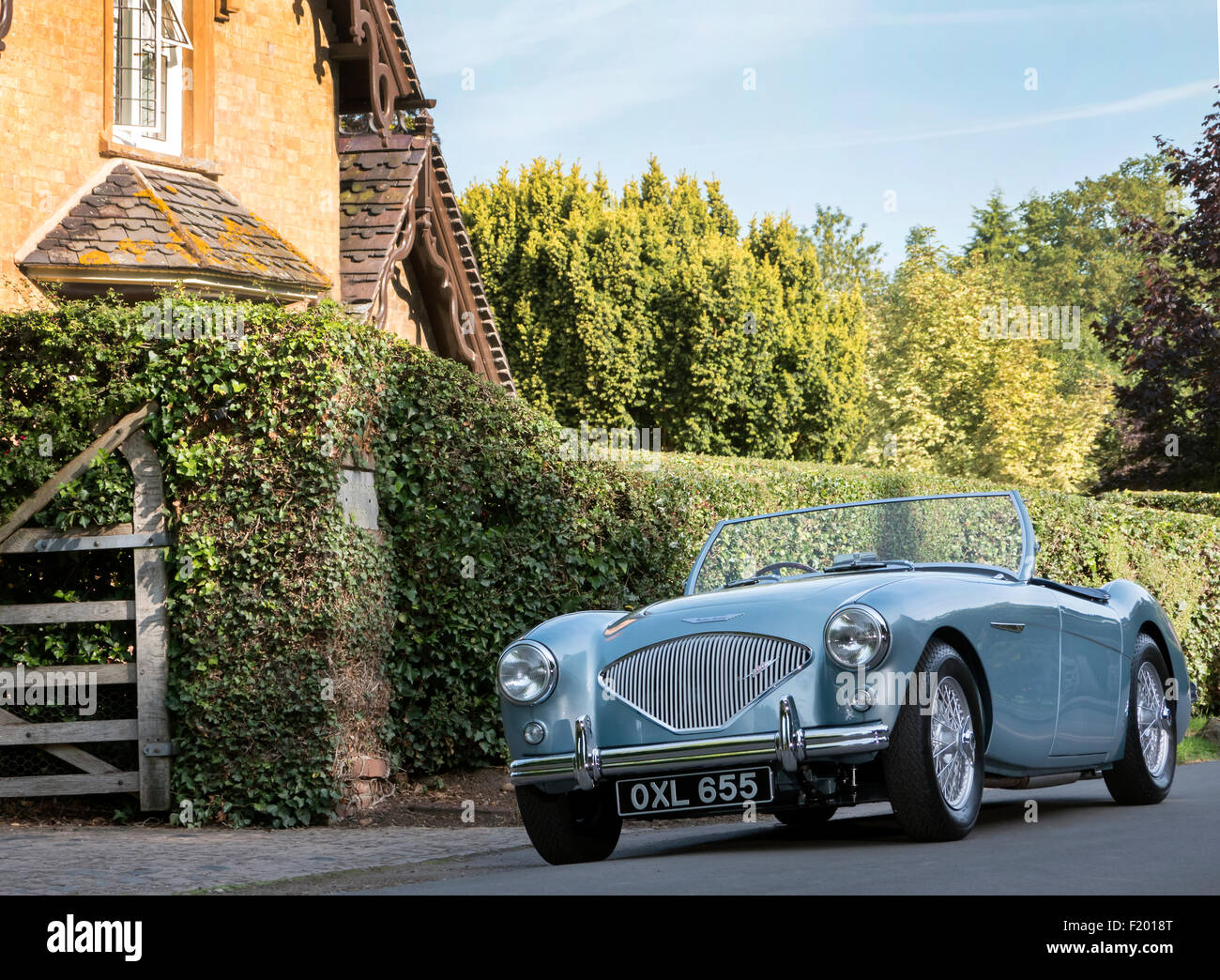 1950's Austin Healey 100M parked in a village in in Warwickshire UK ...