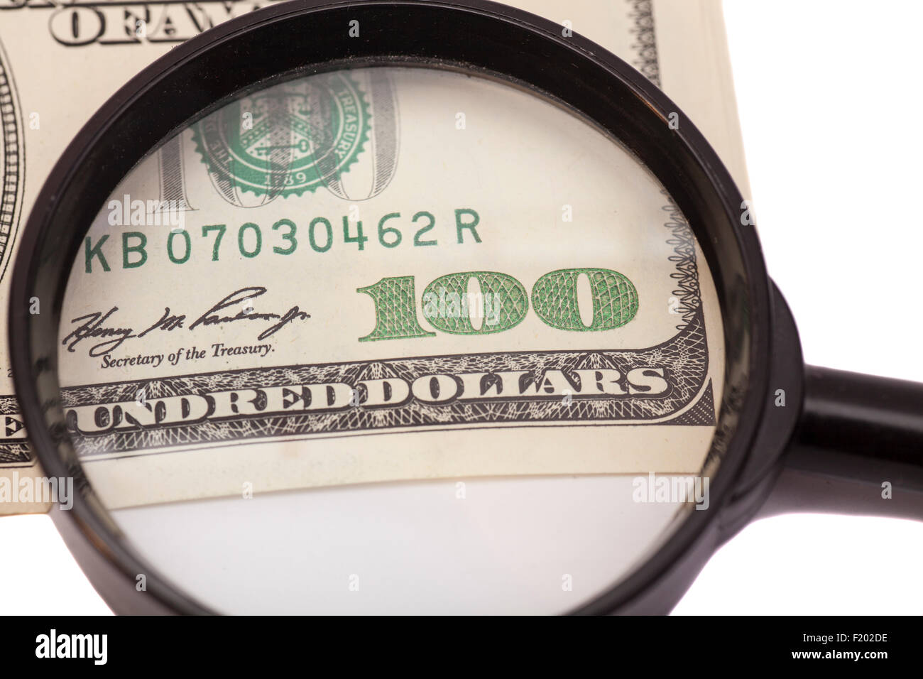 Hundred dollar banknote under magnifying glass Stock Photo - Alamy