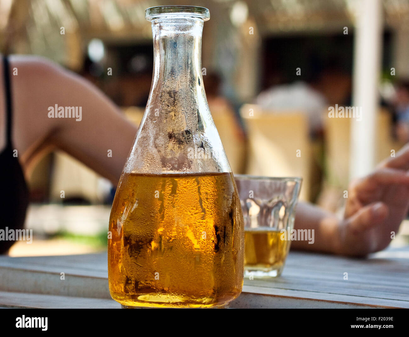 Bottle and glass of Retsina, Greek white wine Stock Photo - Alamy