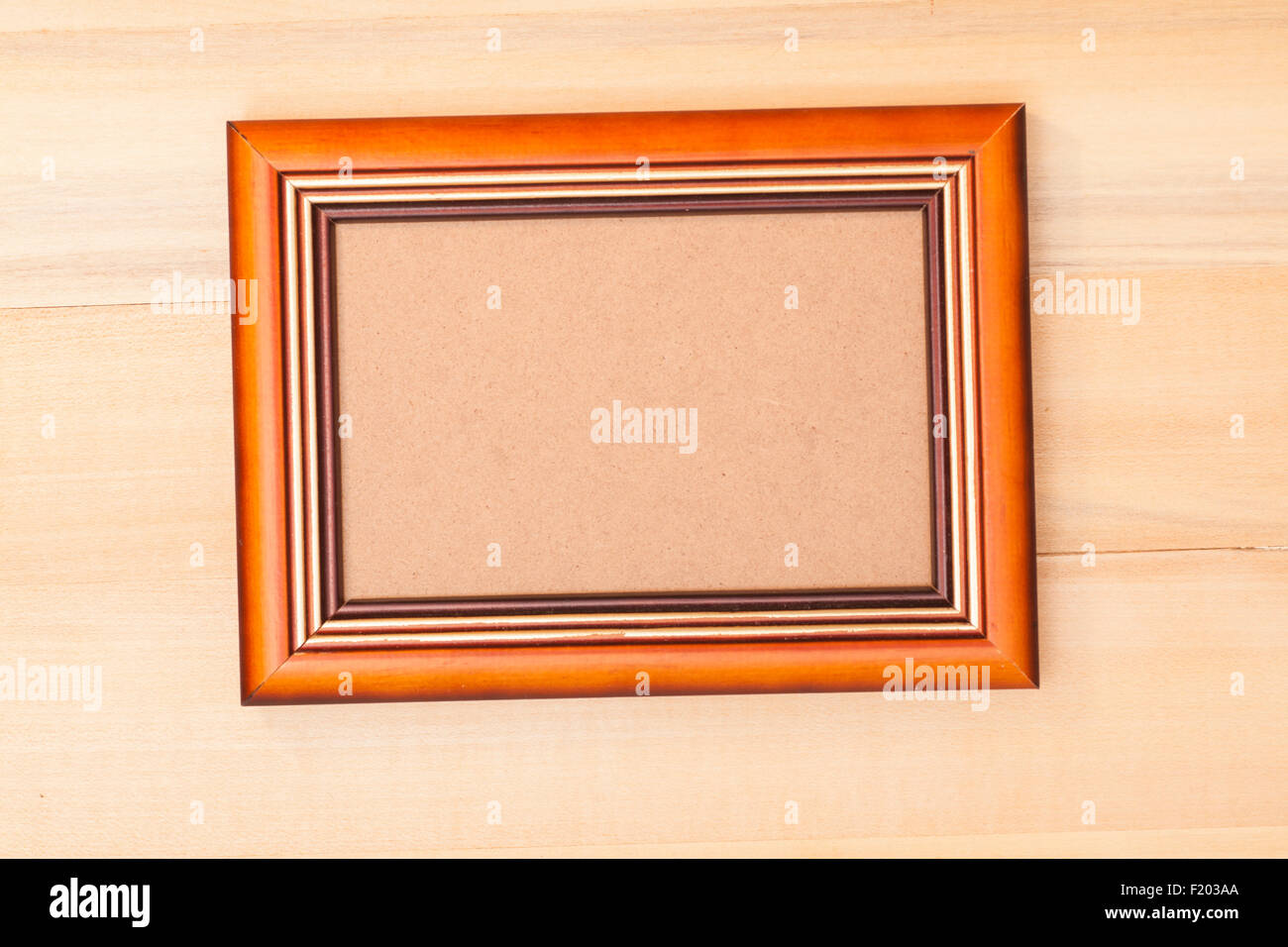 Classic wooden frame on wood background Stock Photo - Alamy