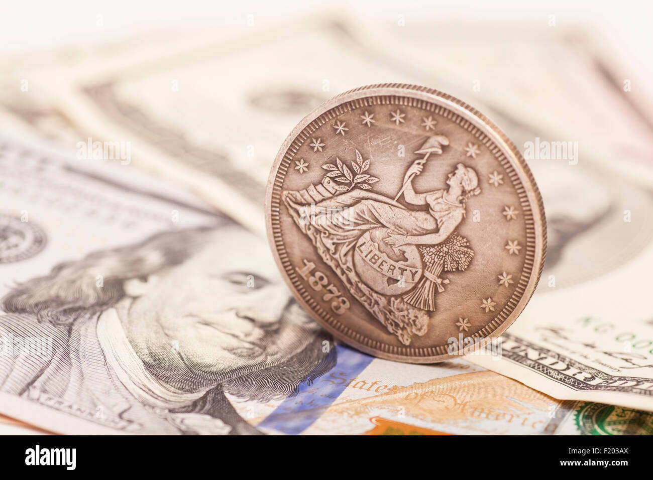 US dollar bills and coin Stock Photo - Alamy