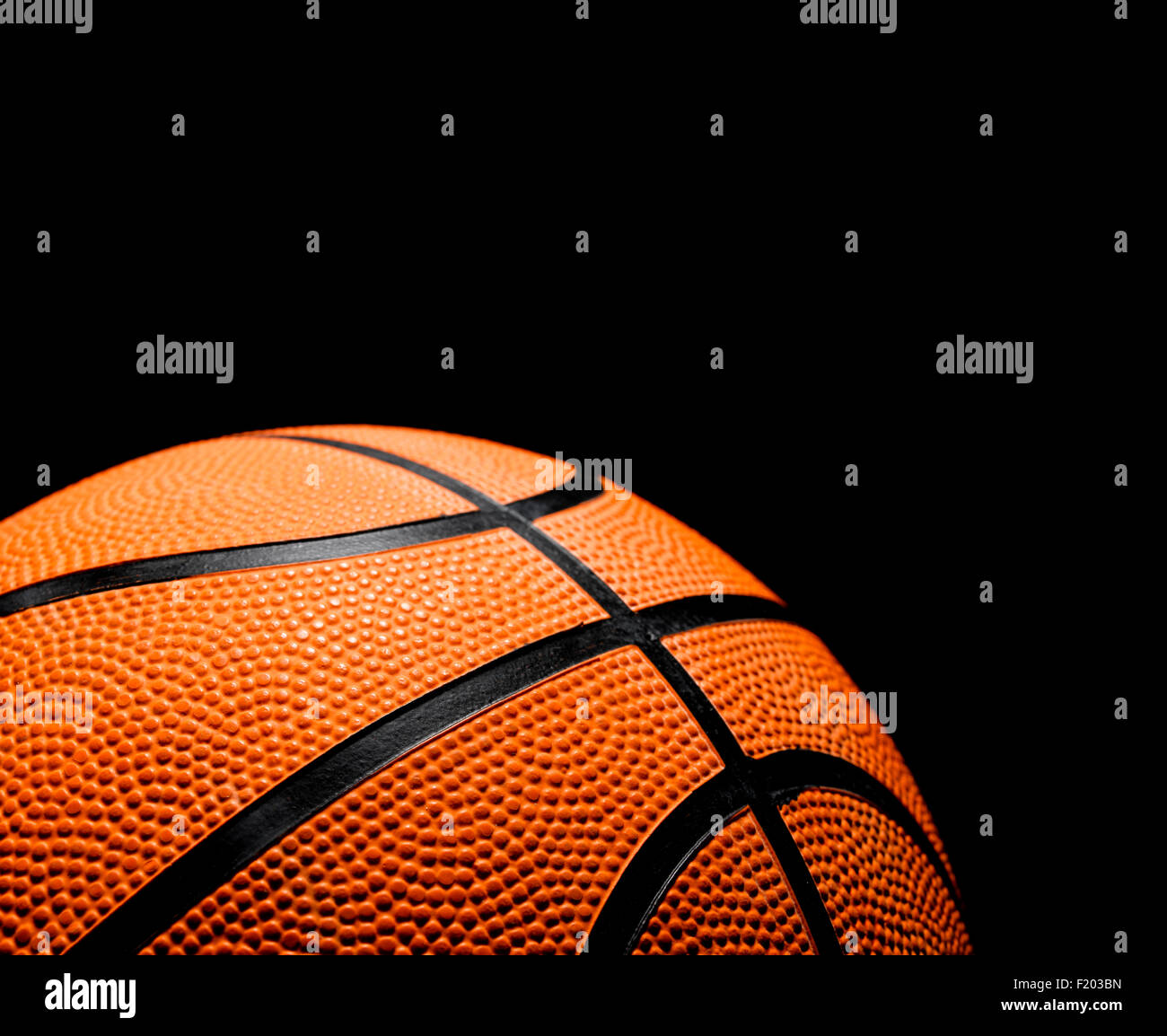 Single Basketball on a black background Stock Photo - Alamy