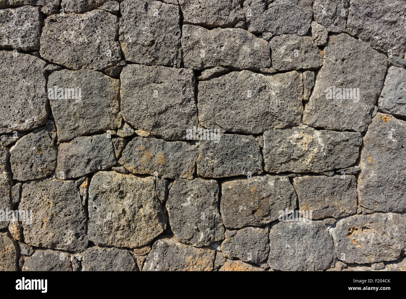 Volcanic Stone wall, useful for background Stock Photo - Alamy
