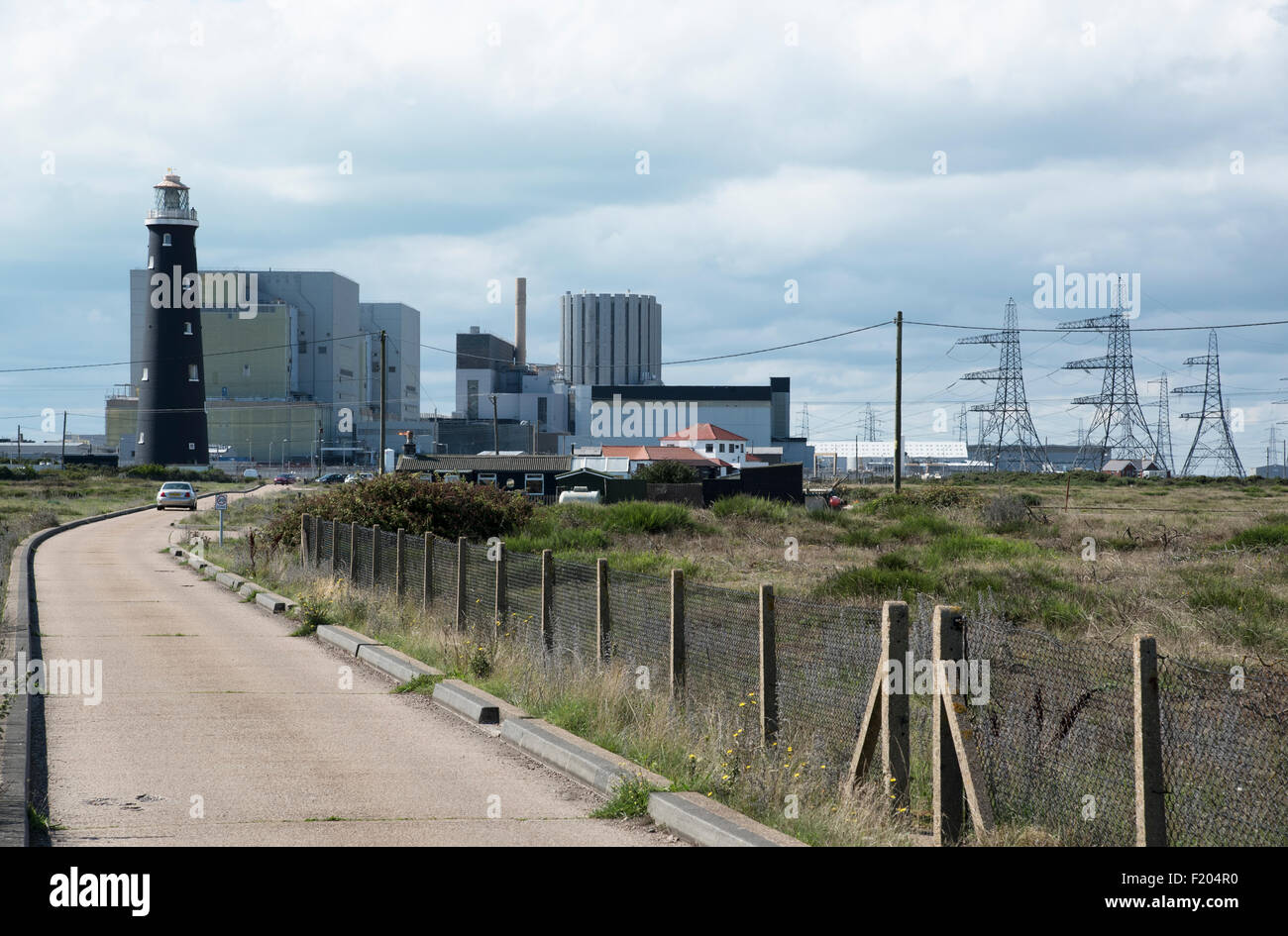 Dungeness Nuclear Power stations A and B with the old lighthouse at ...