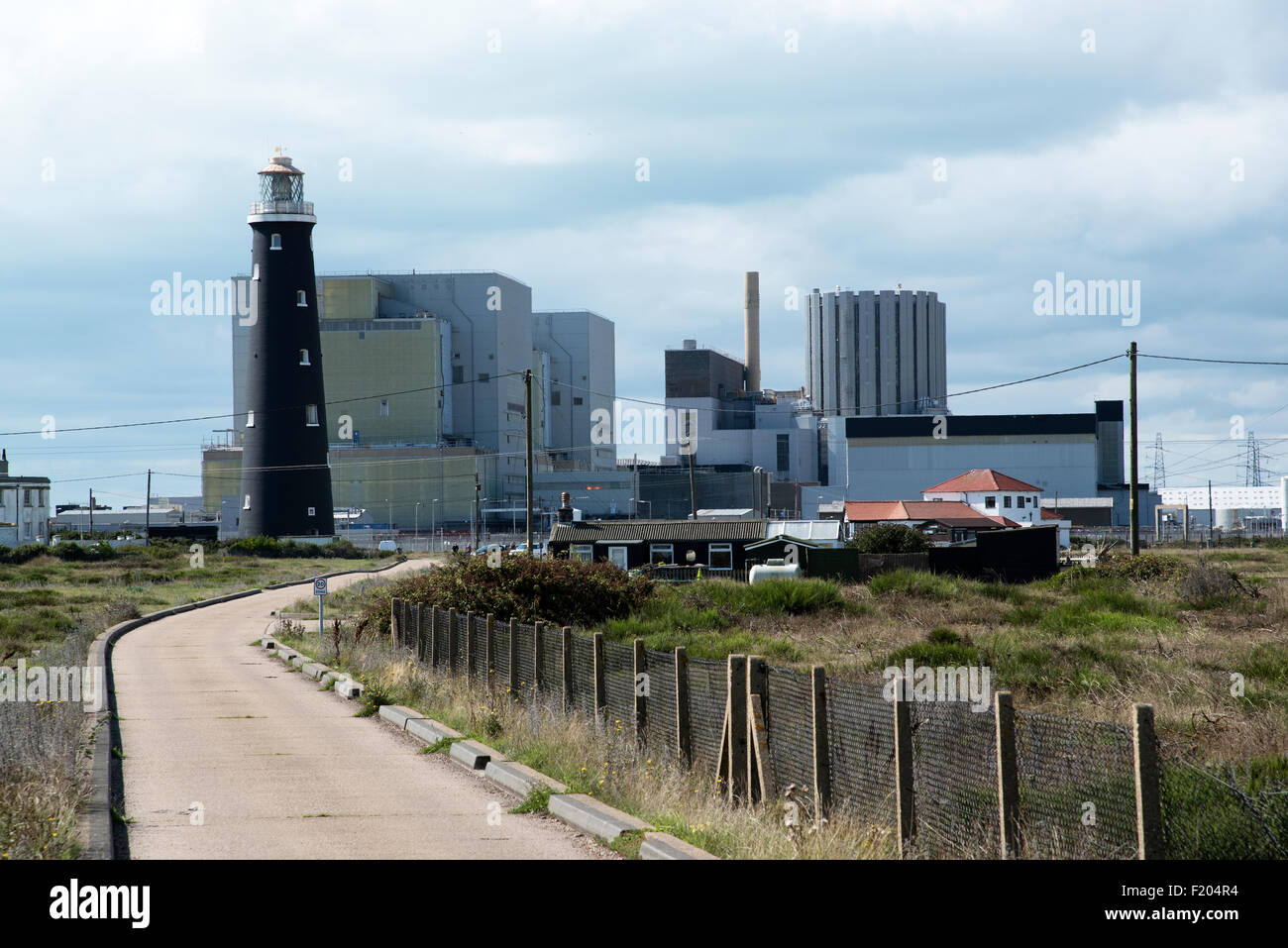 Dungeness Nuclear Power stations A and B with the old lighthouse at ...