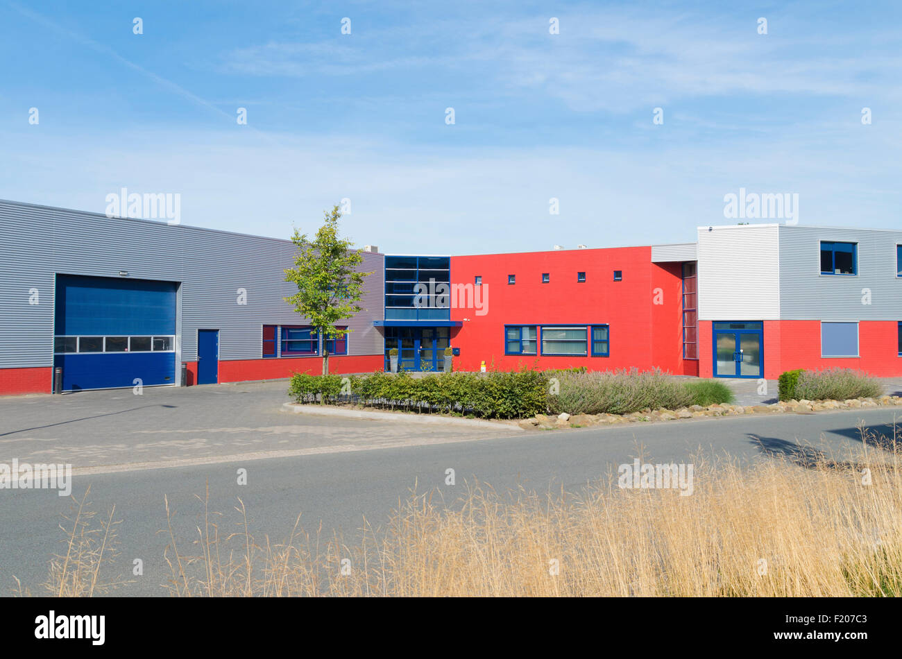 exterior of a modern warehouse building with office Stock Photo - Alamy