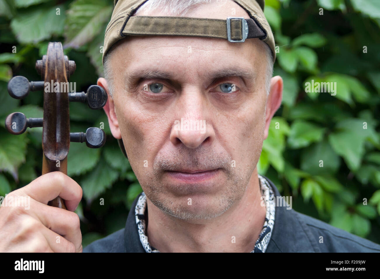 Man With Violin Neck Stock Photo - Alamy