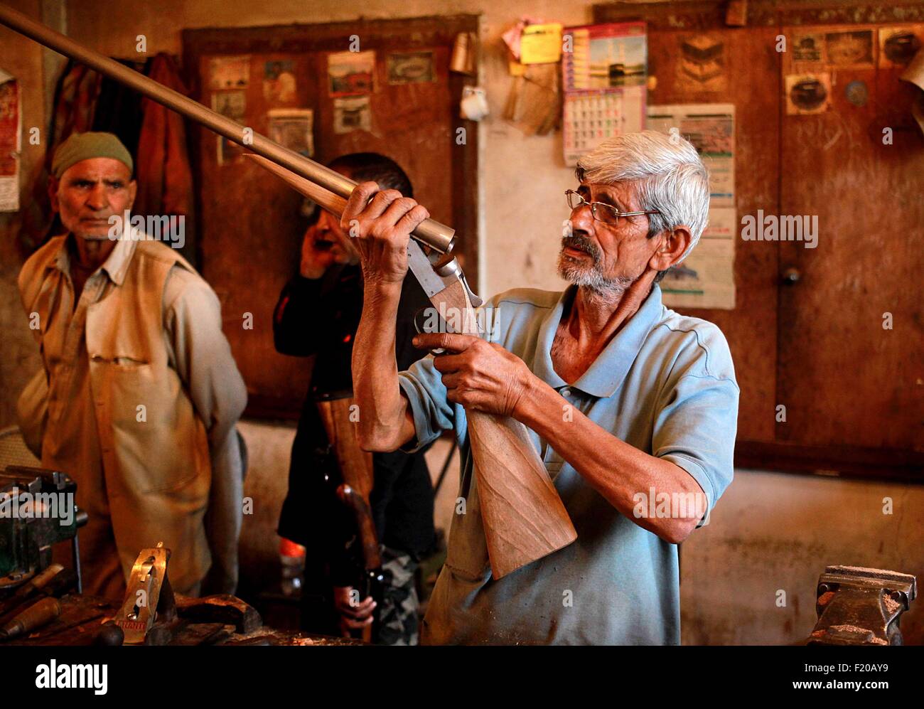 Srinagar, Indian-controlled Kashmir. 9th Sep, 2015. A gunsmith works at ...