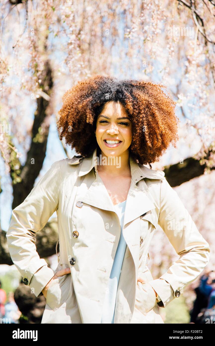 Female smiling pockets hi-res stock photography and images - Alamy