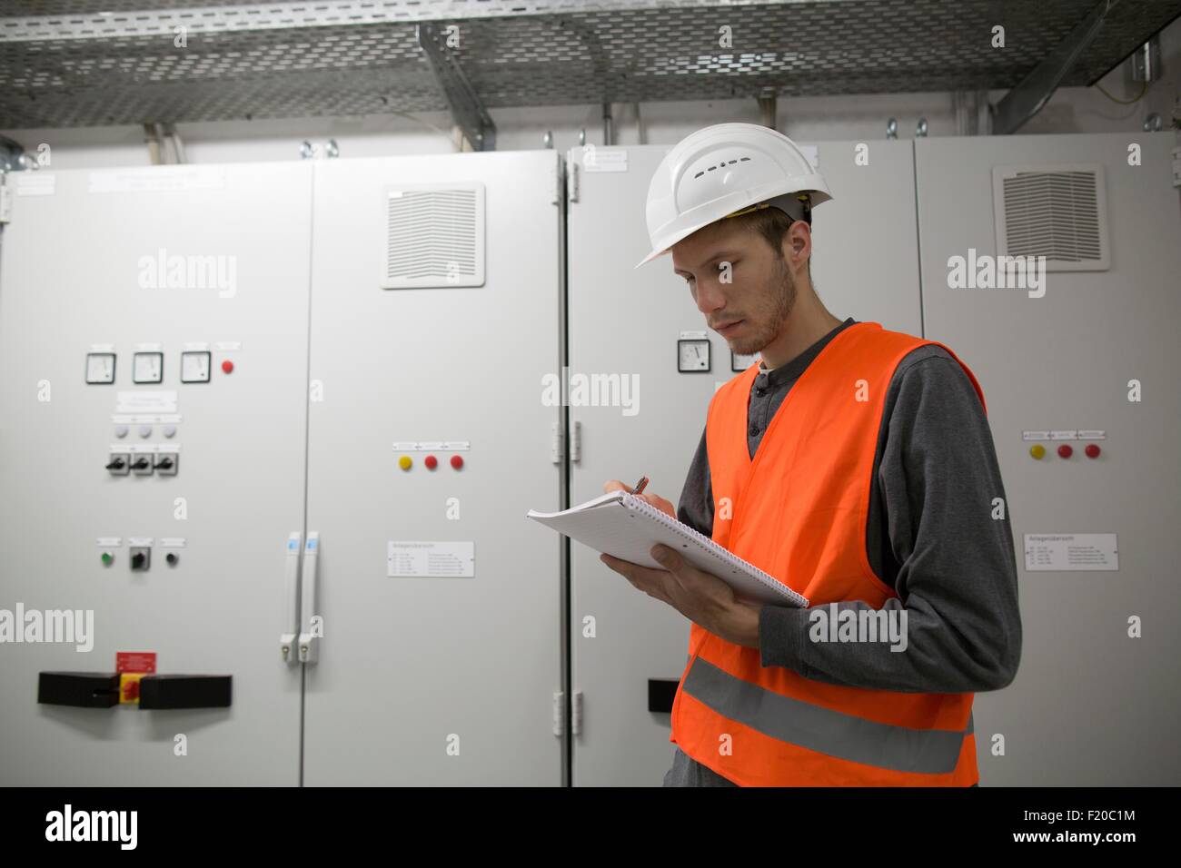 Engineer monitoring control room hi-res stock photography and images ...