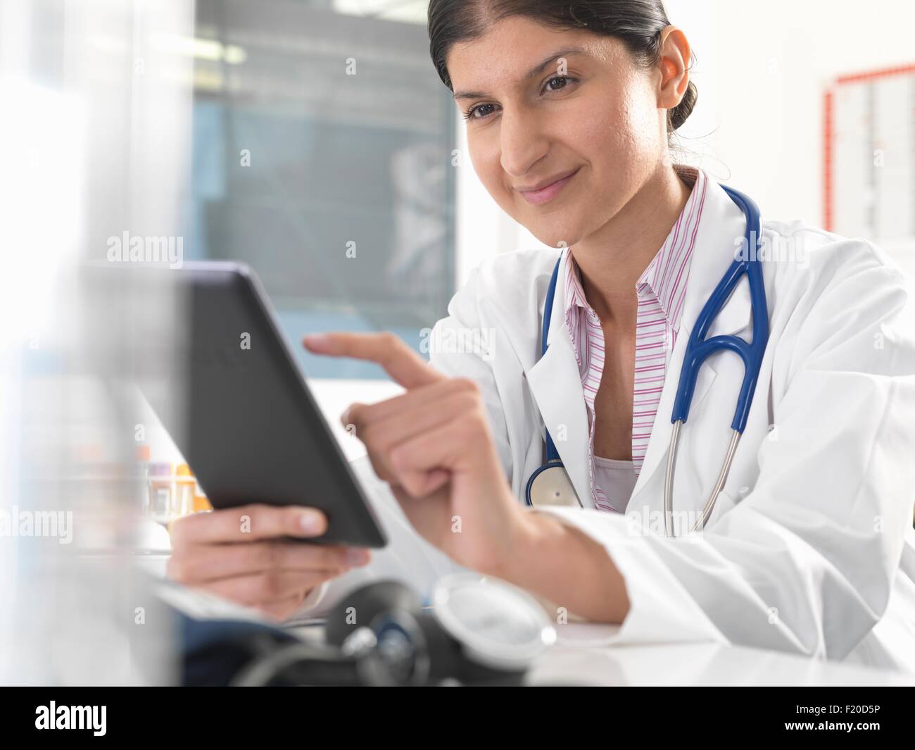 Doctor with touch tablet hi-res stock photography and images - Alamy