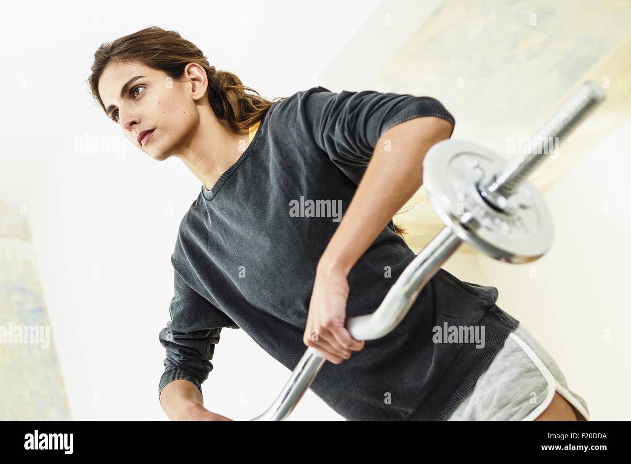 Female lifting barbell hi-res stock photography and images - Alamy