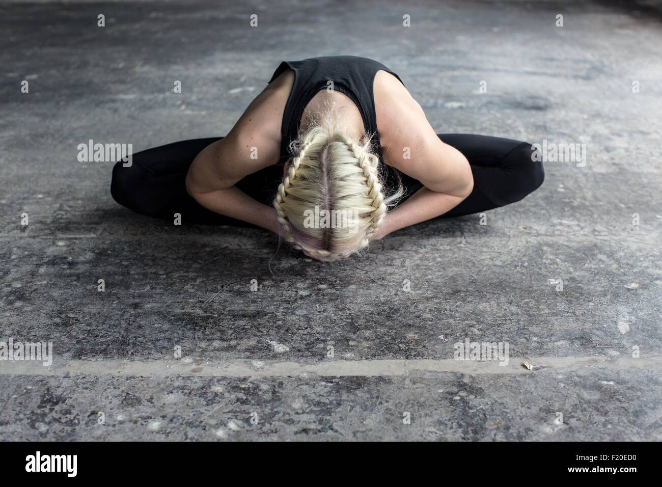 Dancer stretching in studio Stock Photo - Alamy