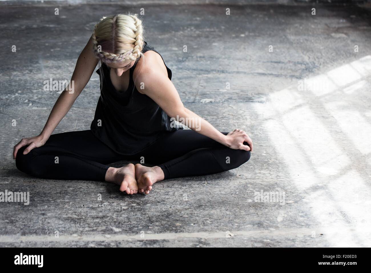 Dancer stretching in studio Stock Photo - Alamy