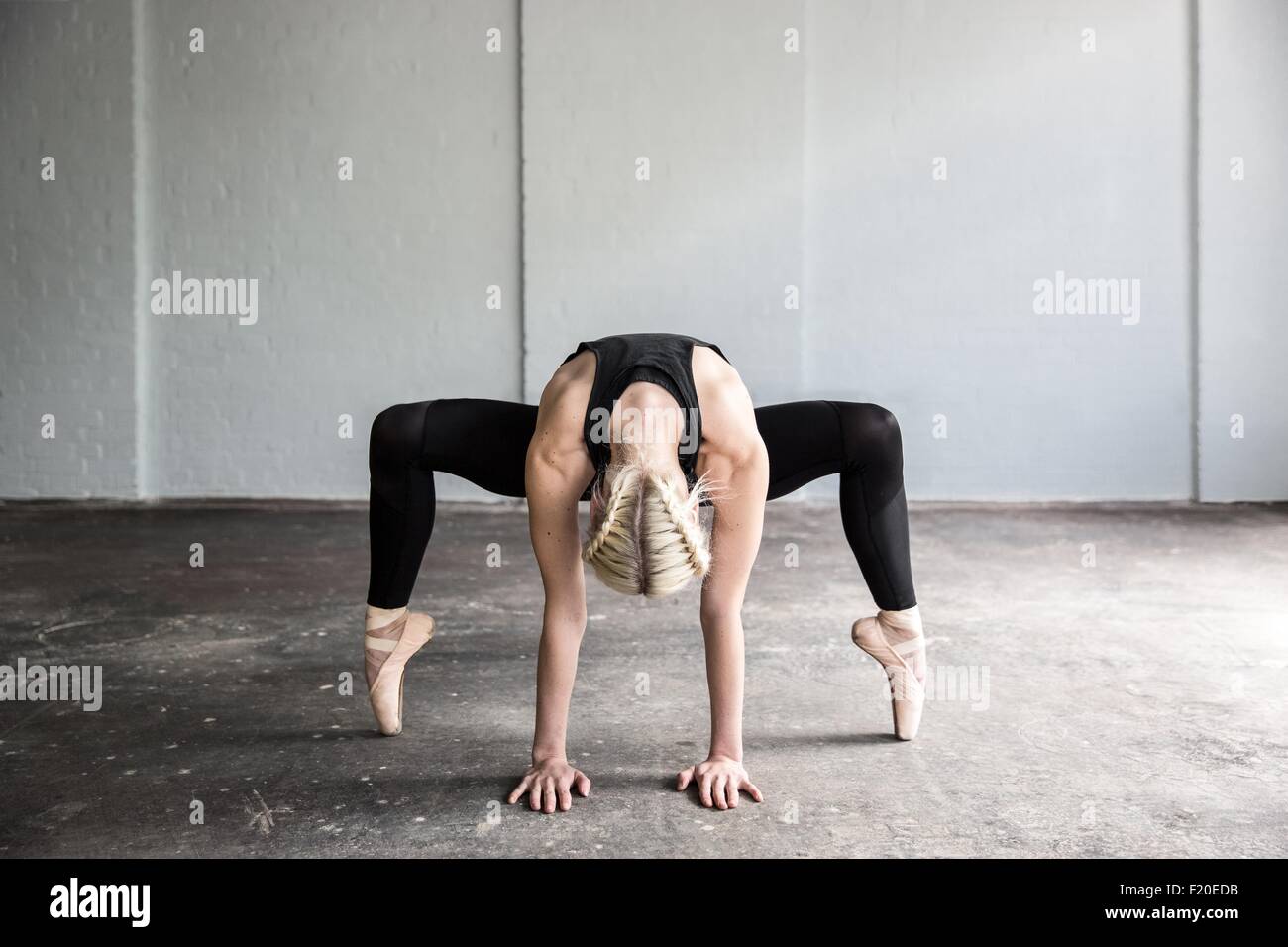 Dancer bending forward hi-res stock photography and images - Alamy