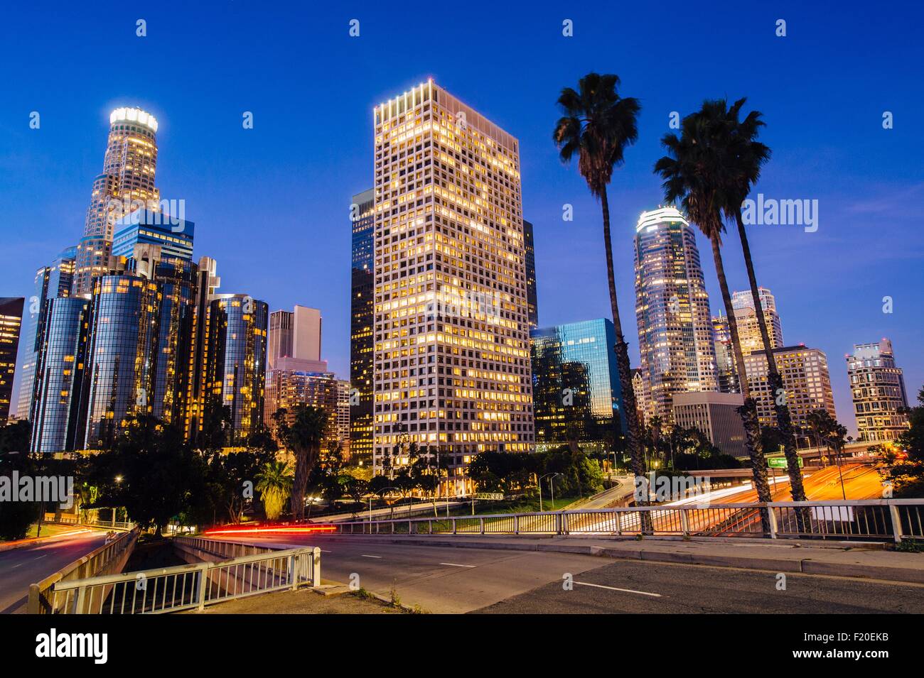 View of highway and city skyline at dusk, Los Angeles, California, USA ...