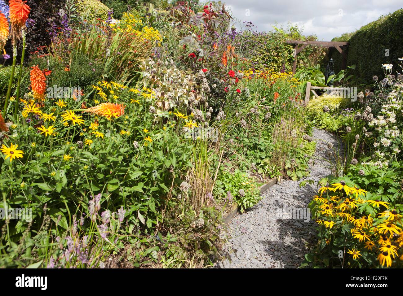 Poppy Cottage Garden on Roseland Peninsula in Cornwall Stock Photo - Alamy