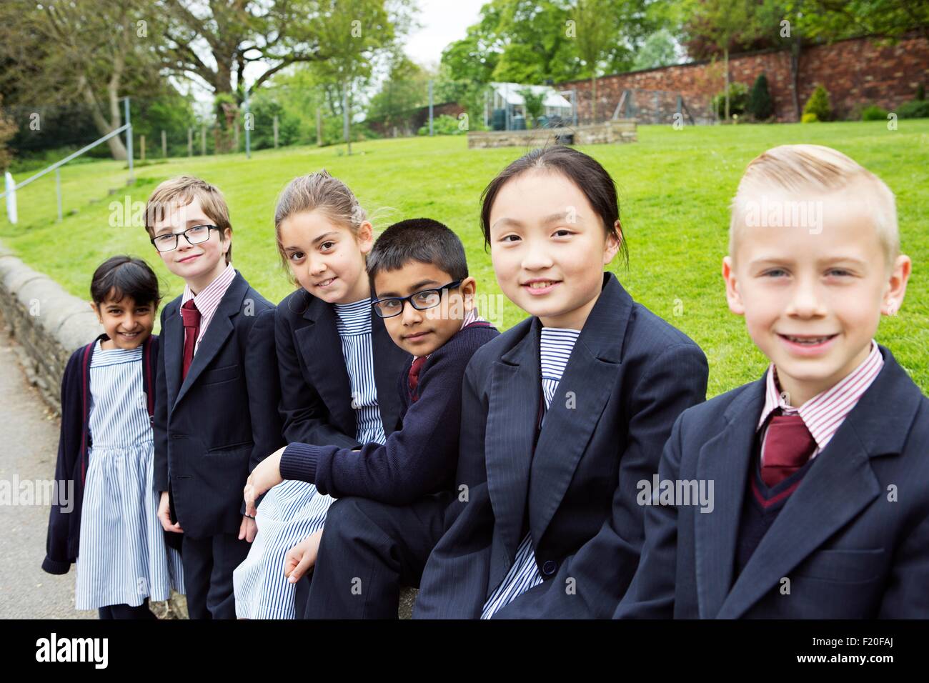Group of young classmates in playground Stock Photo - Alamy